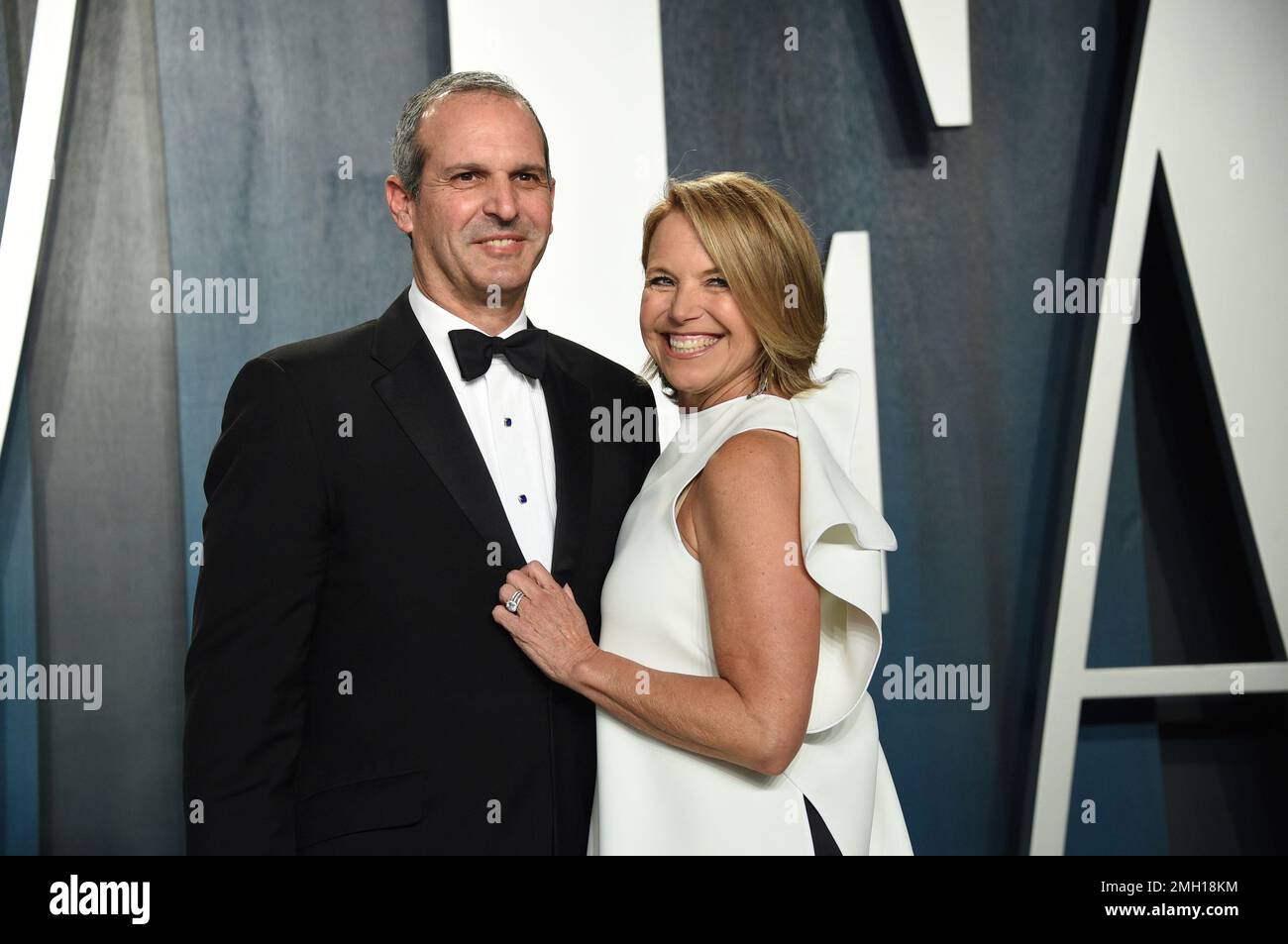 John Molner, left, and Katie Couric arrive at the Vanity Fair Oscar ...