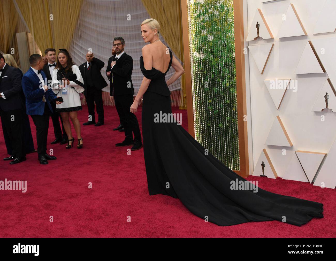 Charlize Theron arrives at the Oscars on Sunday, Feb. 9, 2020, at the ...