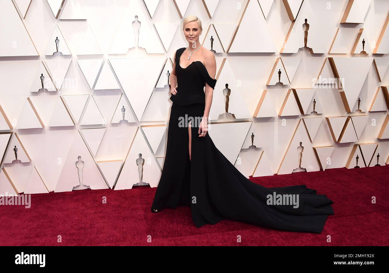 Charlize Theron arrives at the Oscars on Sunday, Feb. 9, 2020, at the ...