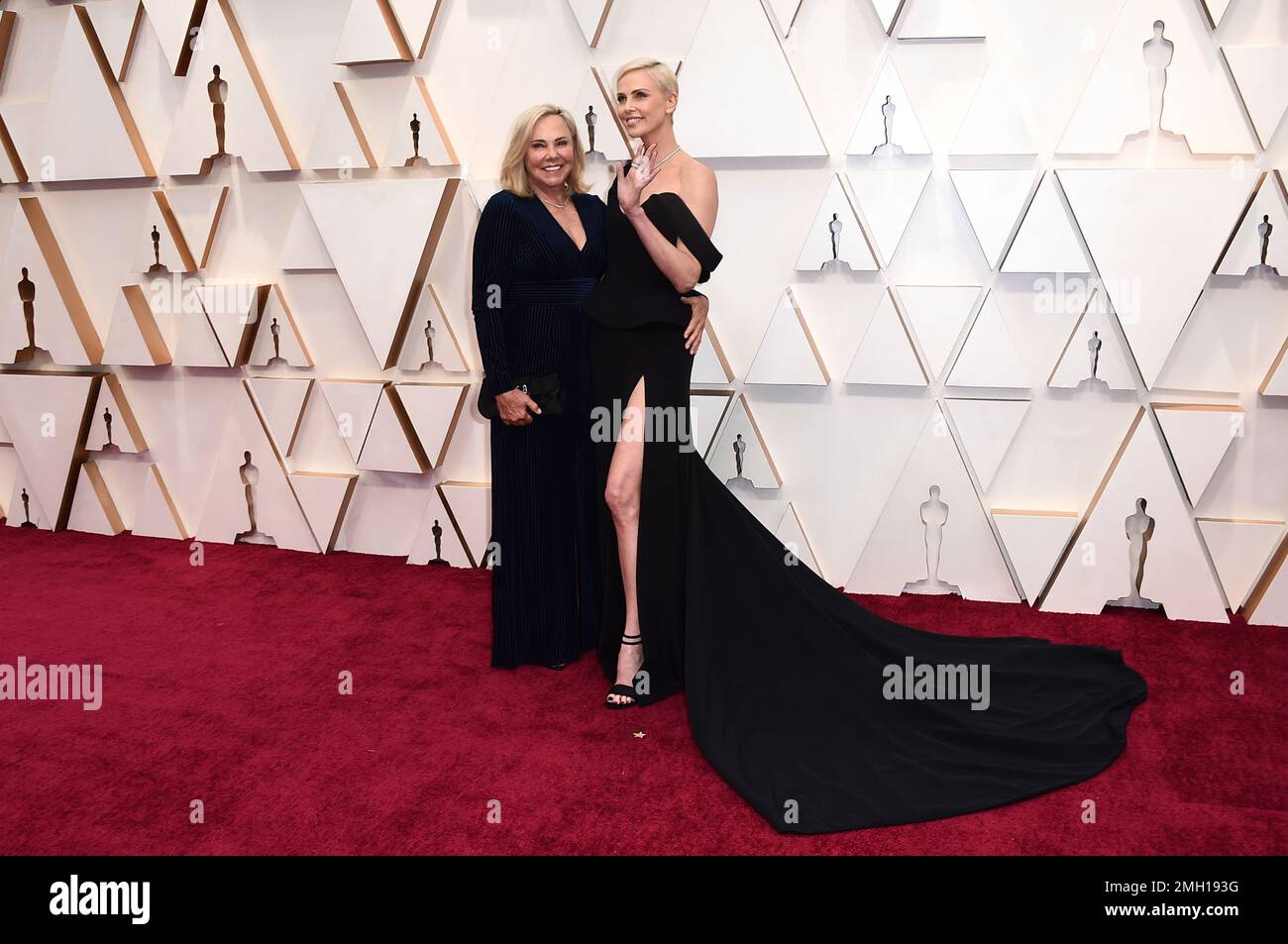 Gerda Maritz, left, and Charlize Theron arrive at the Oscars on Sunday ...