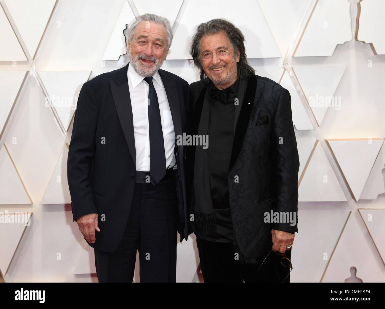 Robert De Niro, left, and Al Pacino arrive at the Oscars on Sunday, Feb ...