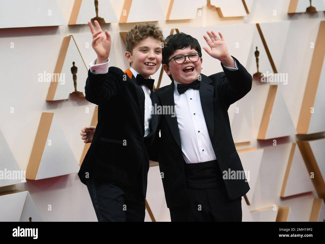 Roman Griffin Davis, left, and Archie Yates arrive at the Oscars on ...