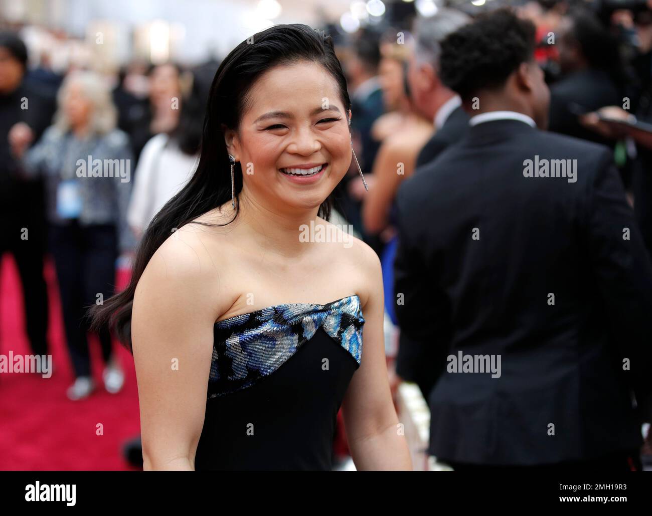 Kelly Marie Tran arrives at the Oscars on Sunday, Feb. 9, 2020, at the ...