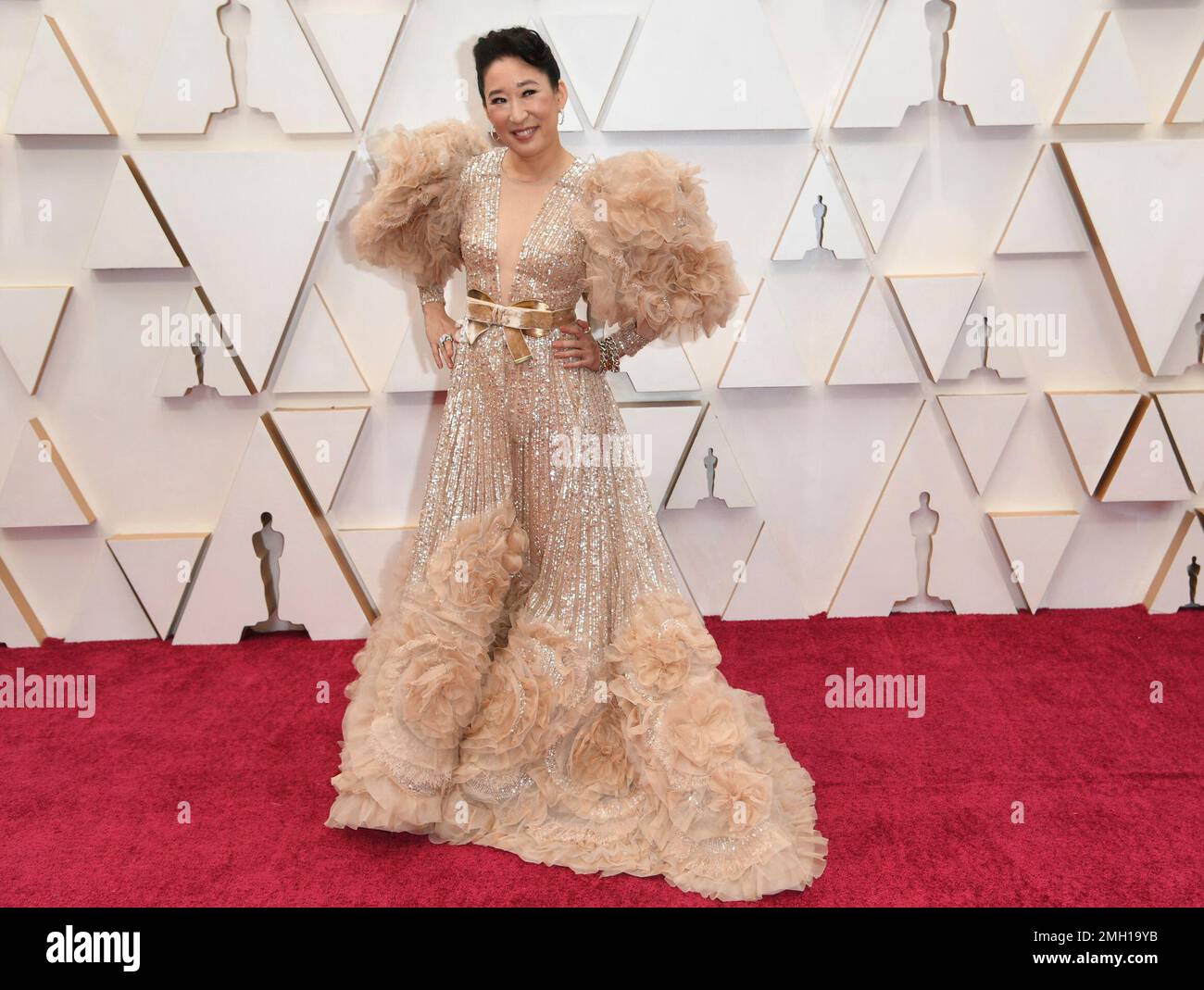 Sandra Oh arrives at the Oscars on Sunday, Feb. 9, 2020, at the Dolby ...