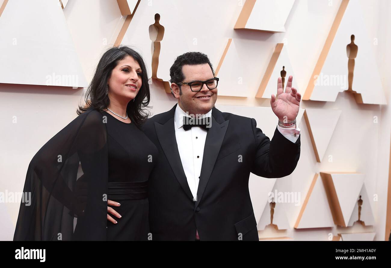 Ida Darvish, left, and Josh Gad arrive at the Oscars on Sunday, Feb. 9, 2020, at the Dolby ...