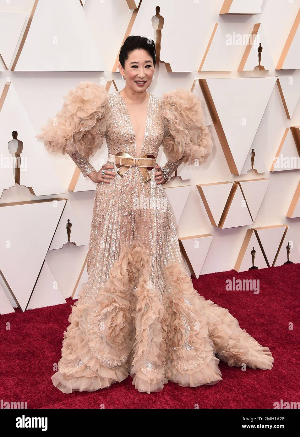 Sandra Oh arrives at the Oscars on Sunday, Feb. 9, 2020, at the Dolby ...