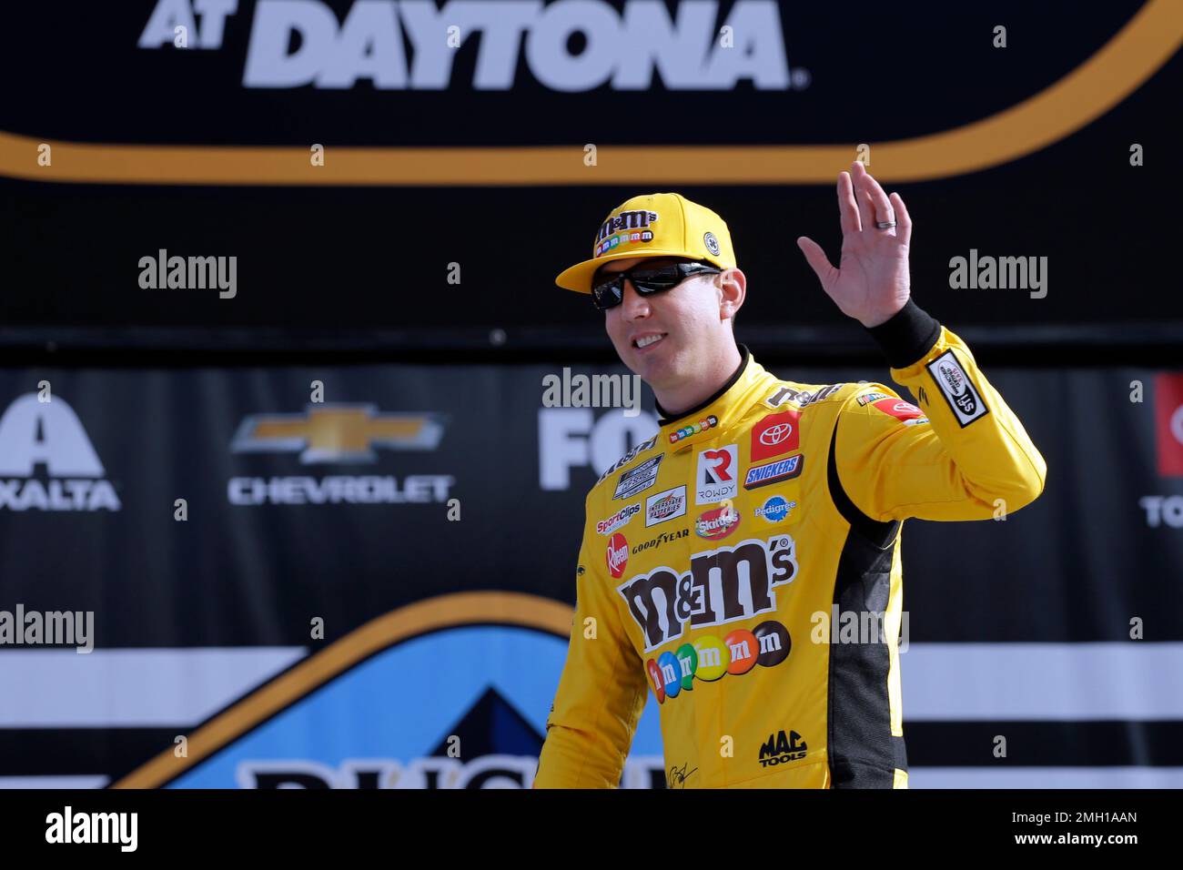 Kyle Busch waves to fans before the NASCAR Busch Clash auto race at ...