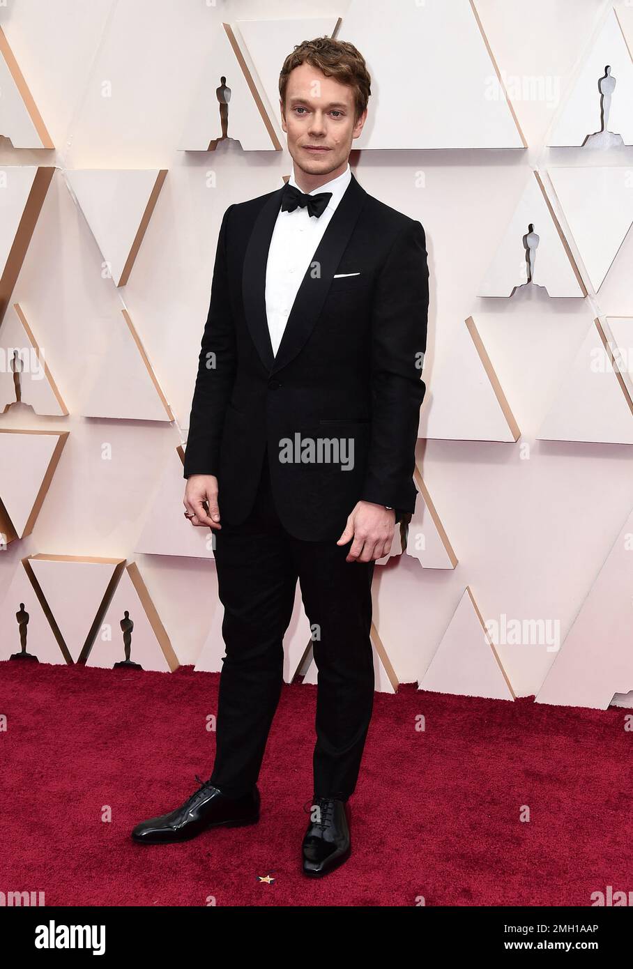 Alfie Allen arrives at the Oscars on Sunday, Feb. 9, 2020, at the Dolby ...