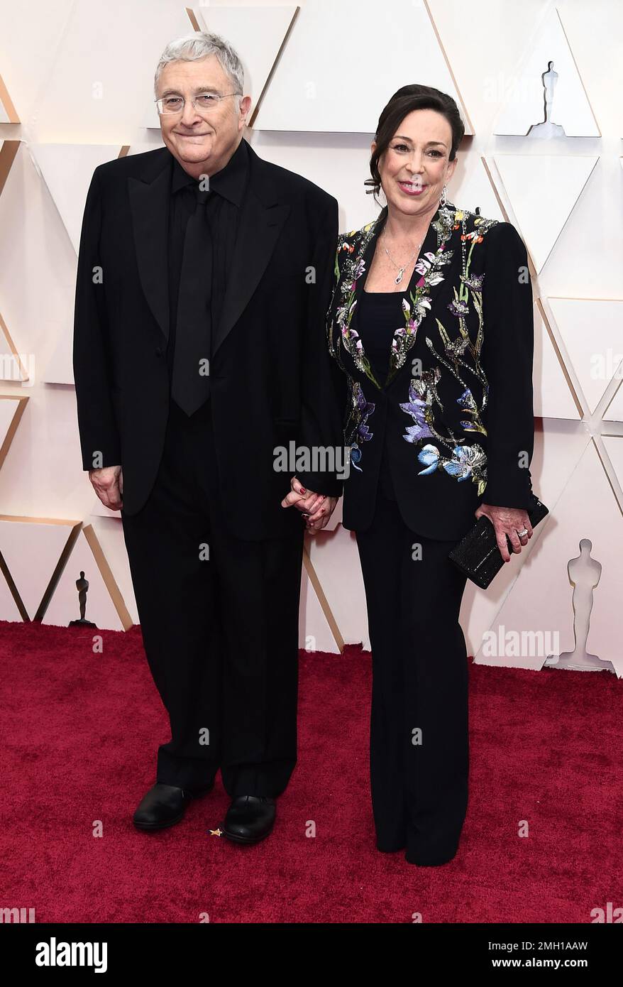 Randy Newman, left, and Gretchen Preece arrive at the Oscars on Sunday ...