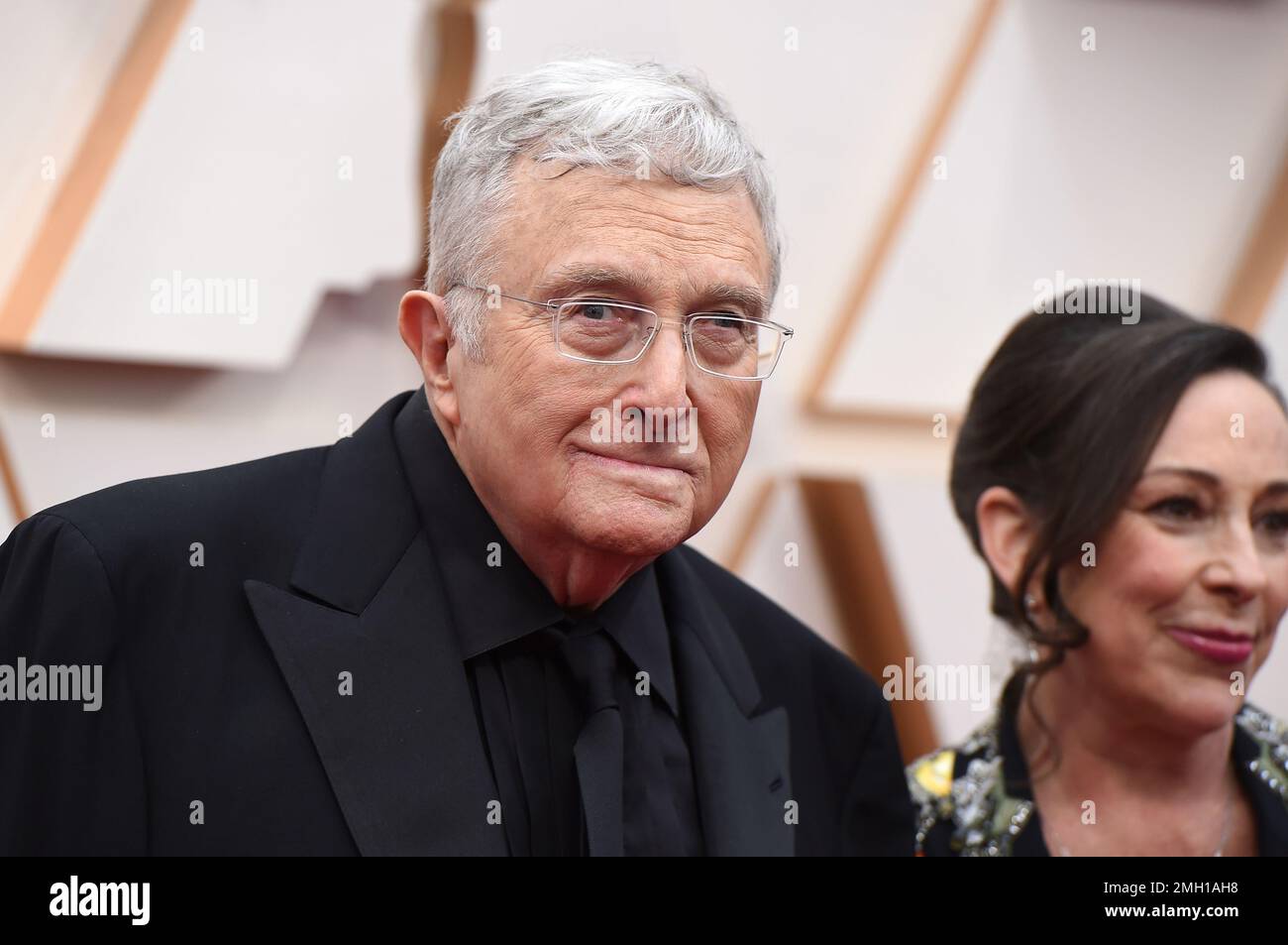Randy Newman, left, and Gretchen Preece arrive at the Oscars on Sunday ...