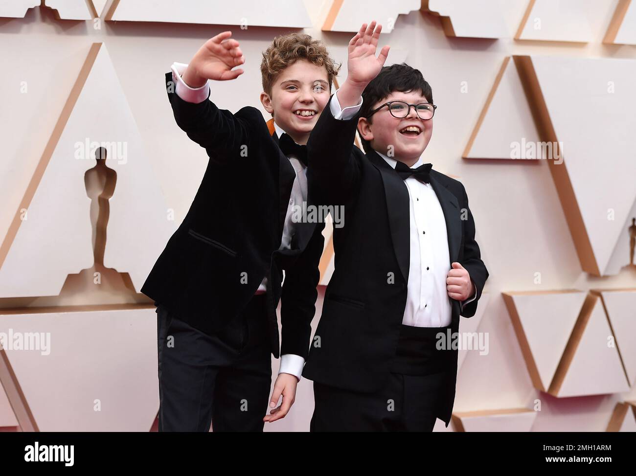 Roman Griffin Davis, left, and Archie Yates arrive at the Oscars on ...