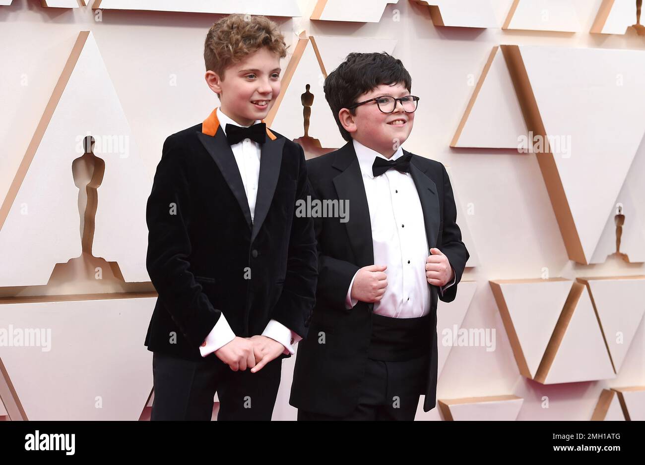 Roman Griffin Davis, left, and Archie Yates arrive at the Oscars on ...