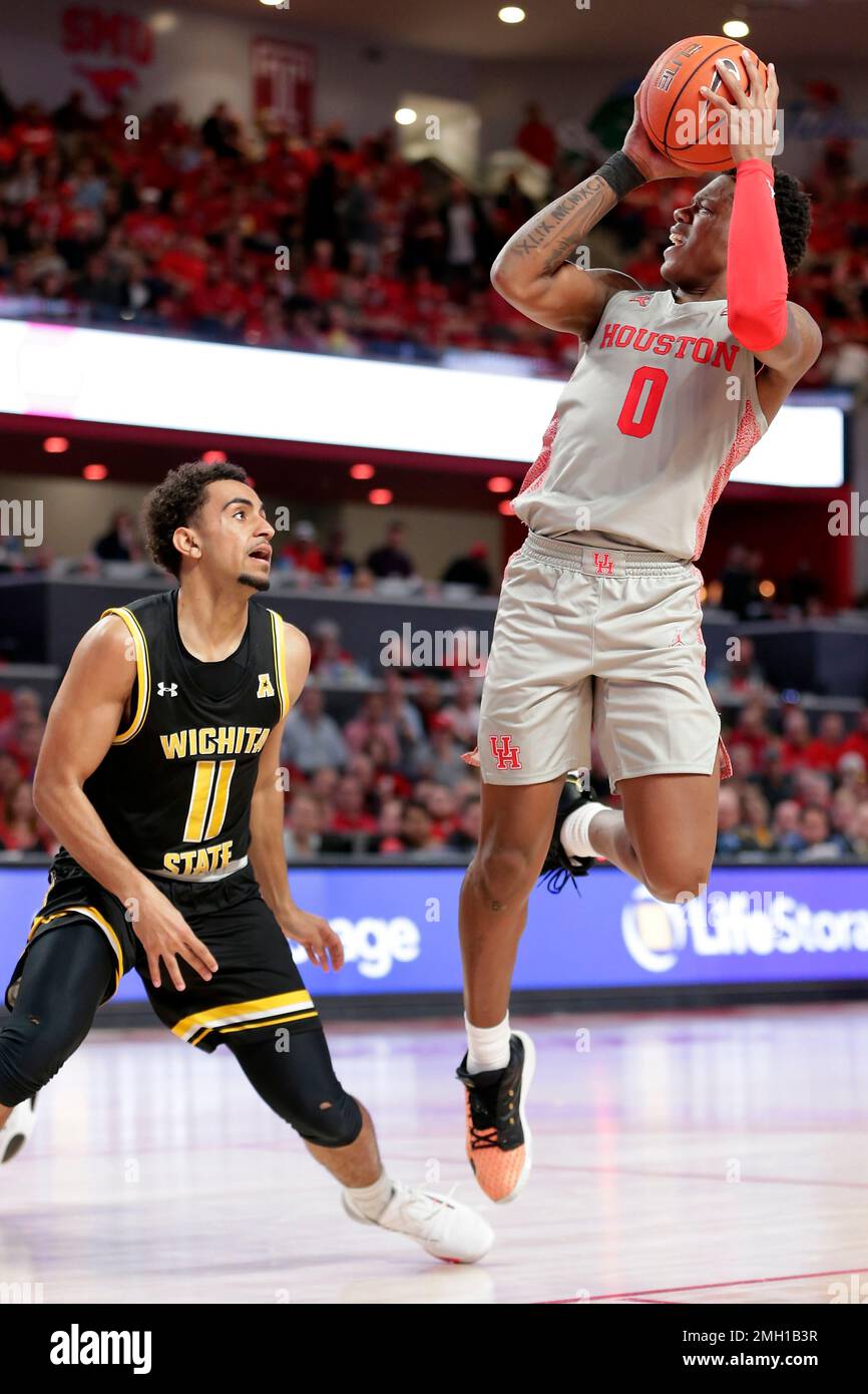 Wichita State guard Noah Fernandes (11) looks on as Houston guard ...