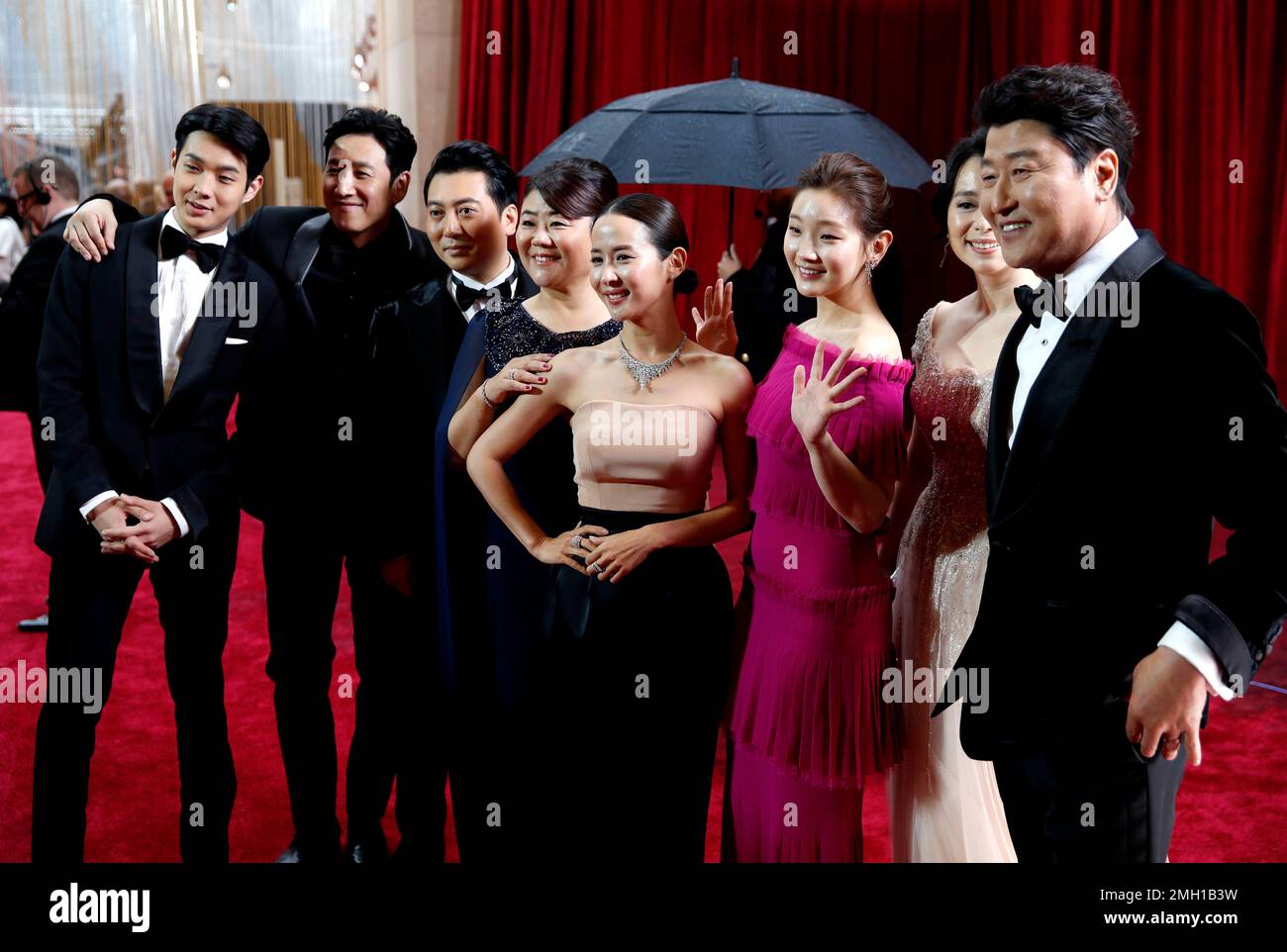 The cast of "Parasite" arrives at the Oscars on Sunday, Feb. 9, 2020 ...