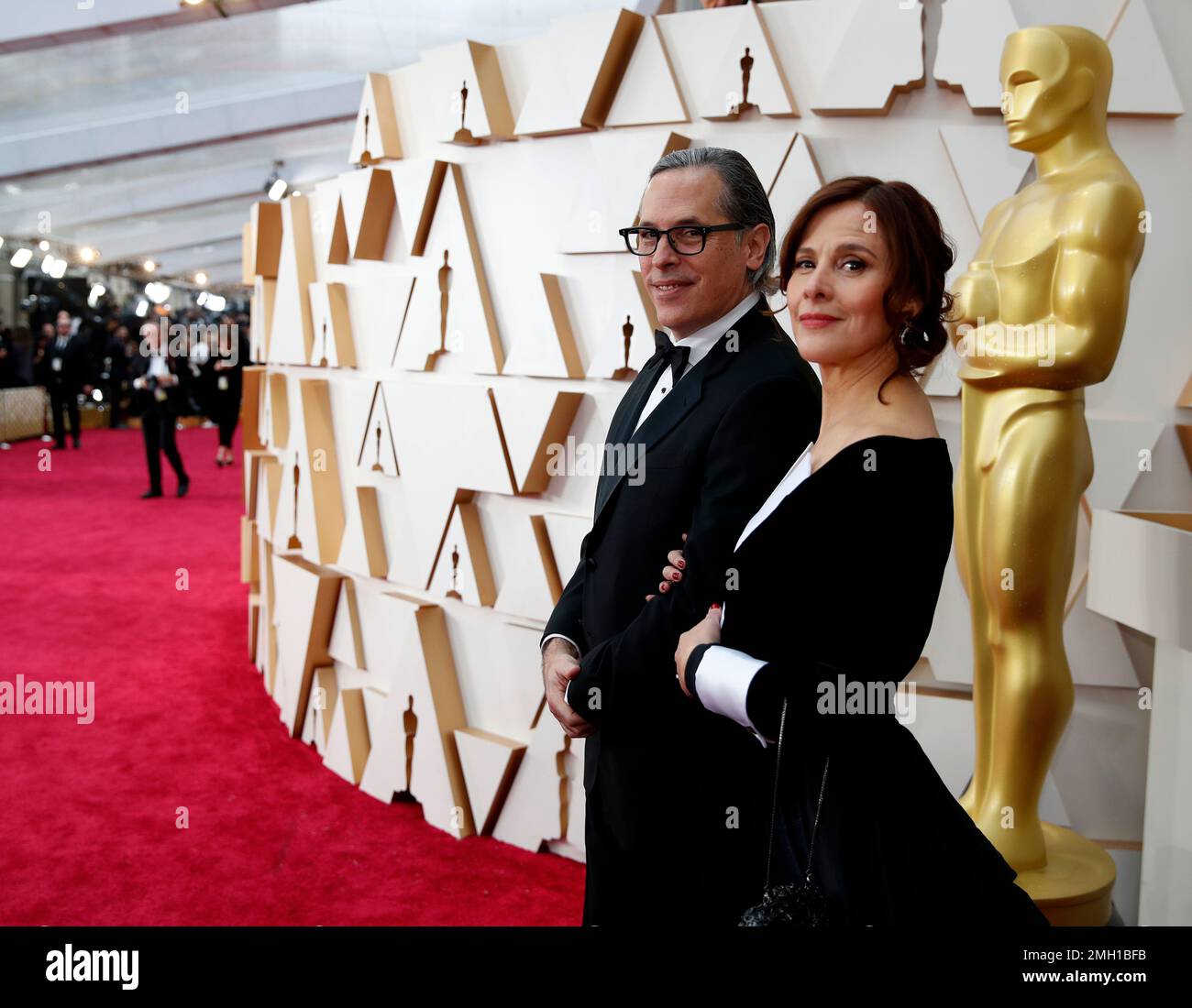 Rodrigo Prieto, left, and Monica Prieto arrive at the Oscars on Sunday ...