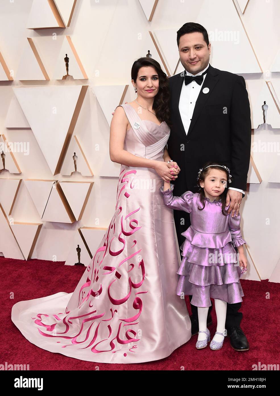 Waad Al-Kateab, left, and Hamza Al-Kateab arrive at the Oscars on ...