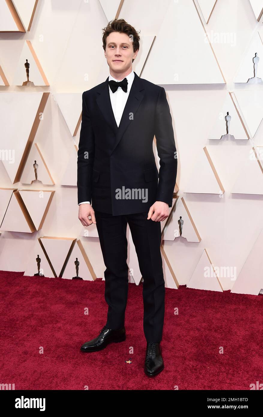 George MacKay arrives at the Oscars on Sunday, Feb. 9, 2020, at the ...