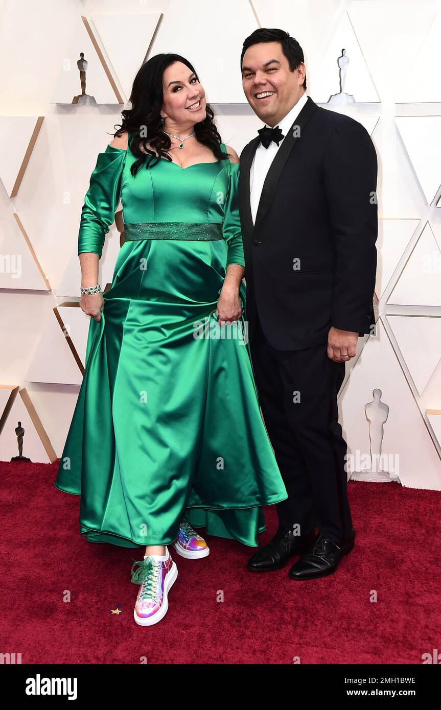 Kristen Anderson-Lopez, left, and Robert Lopez arrive at the Oscars on ...
