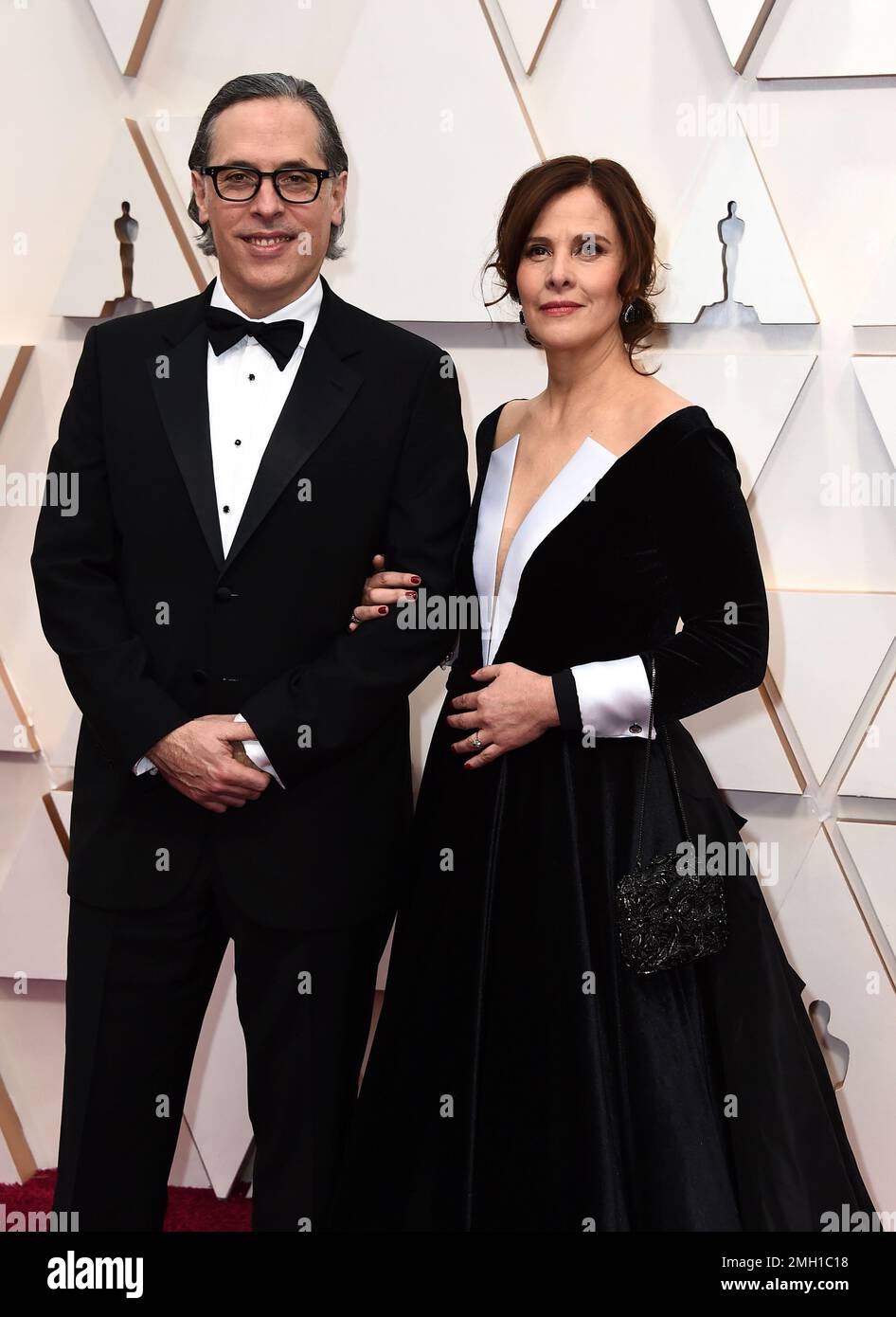 Rodrigo Prieto, left, and Monica Prieto arrive at the Oscars on Sunday ...