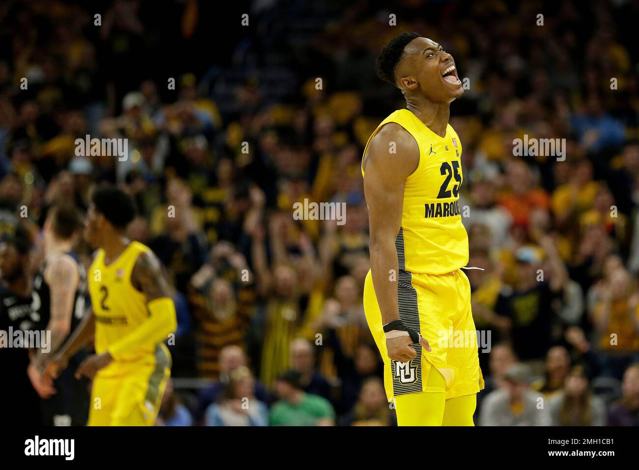 Marquette's Koby McEwen reacts during the second half of an NCAA ...