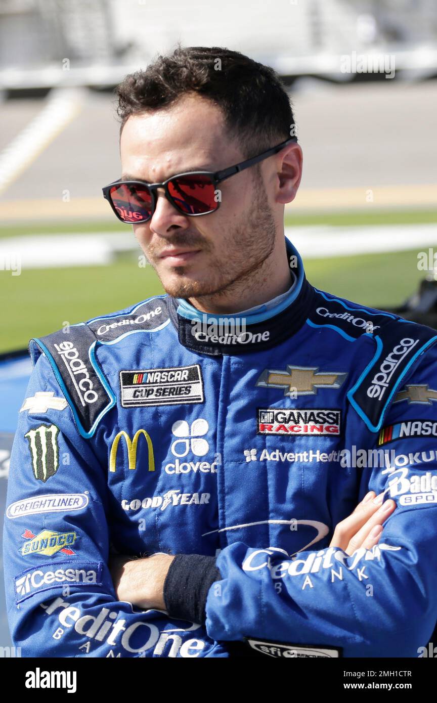Kyle Larson stands on pit road during NASCAR auto race qualifying at ...