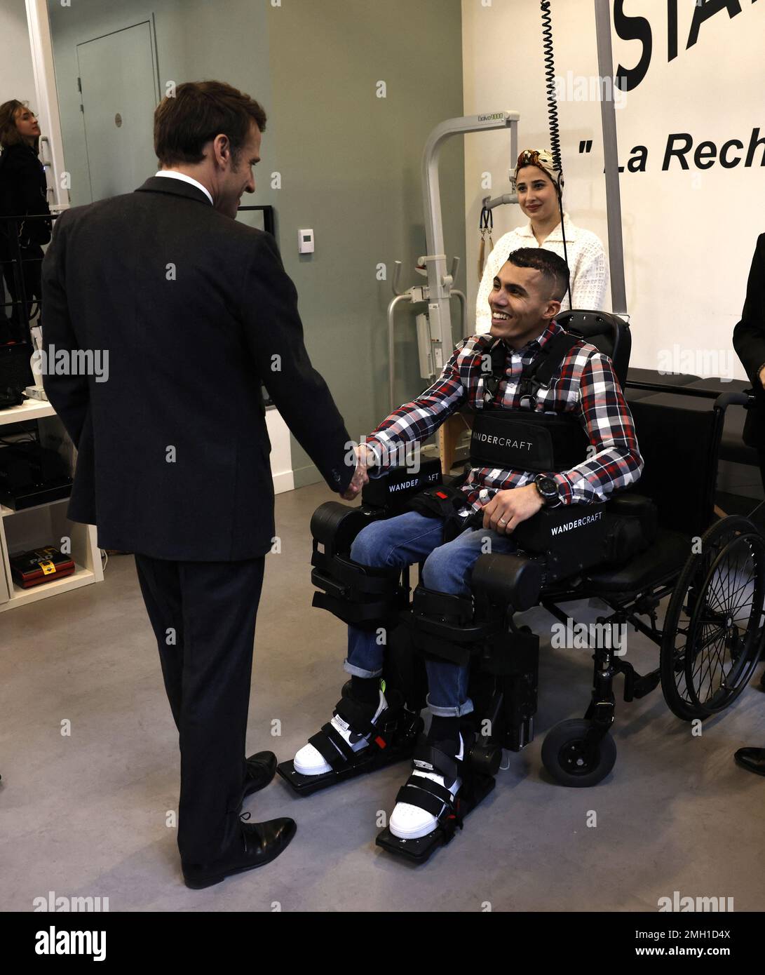 French President Emmanuel Macron (L) discusses with French soldier ...