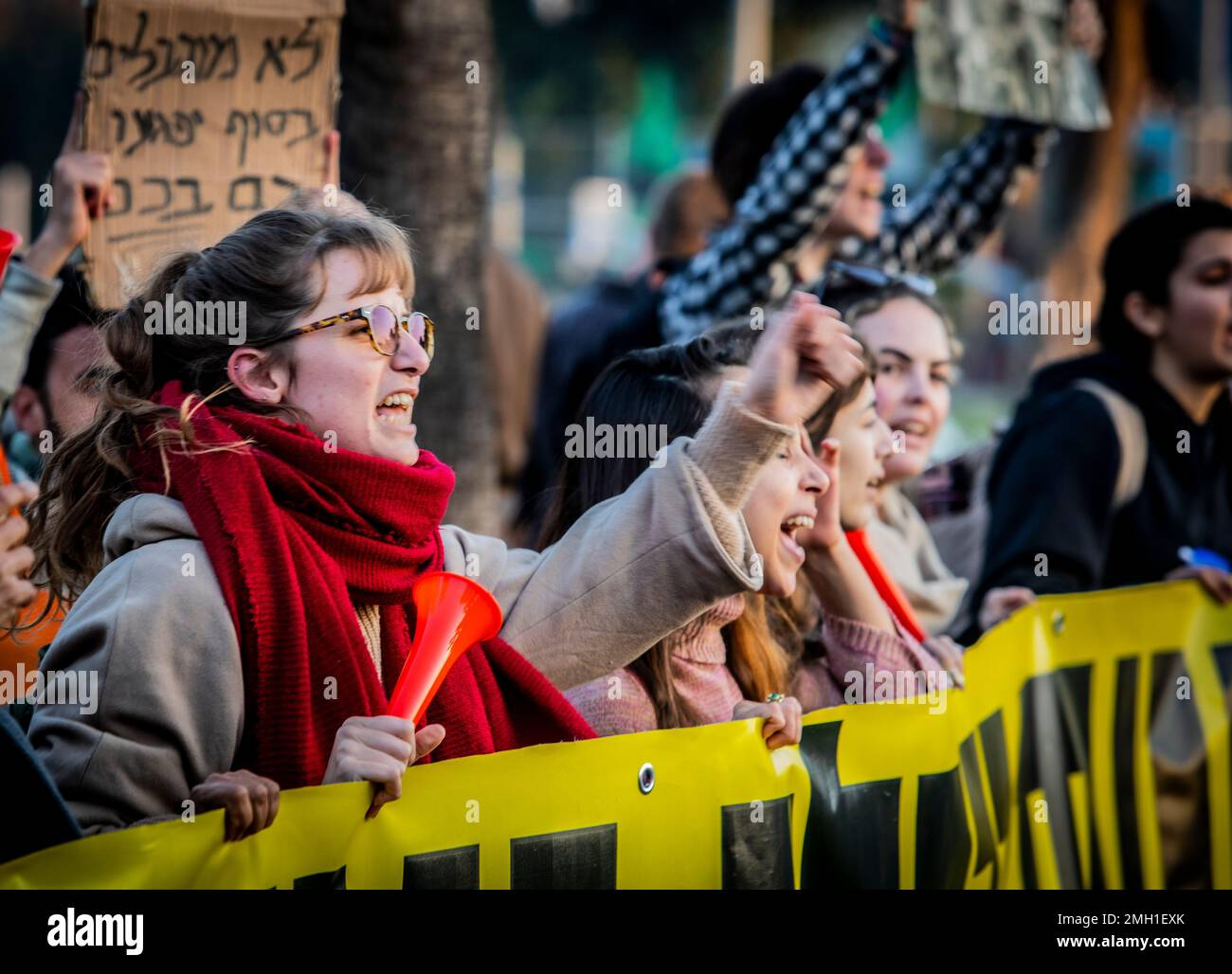 Tel Aviv, Israel. 26th Jan, 2023. Protesters make gestures and chant ...