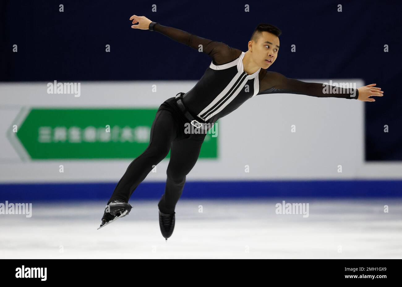 Australia's James Min performs during the men's single free skating ...