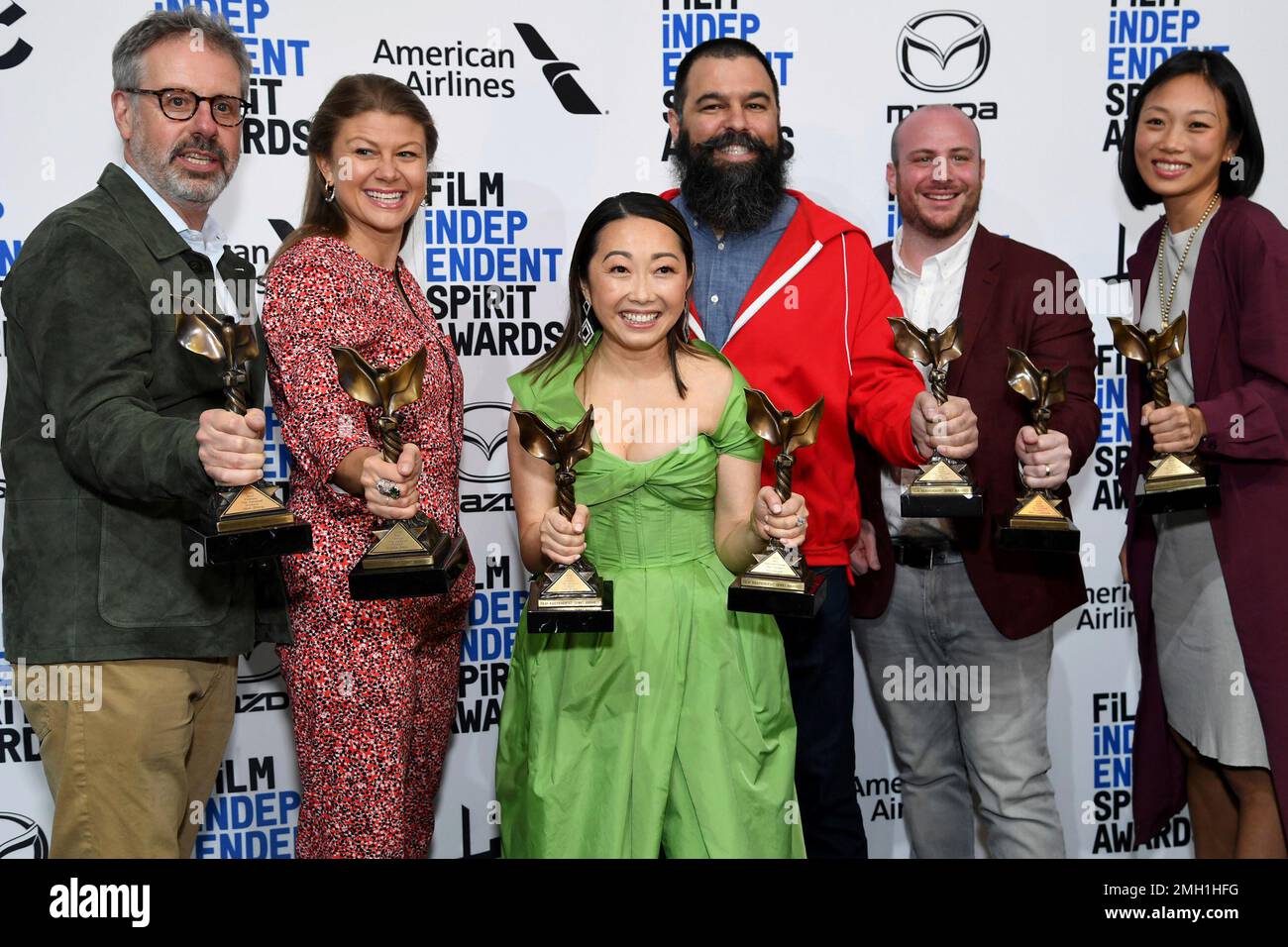 Peter Saraf, from left, Daniele Melia, Lulu Wang, Andrew Miano, Eddie Rubin, Anita Gou pose in ...