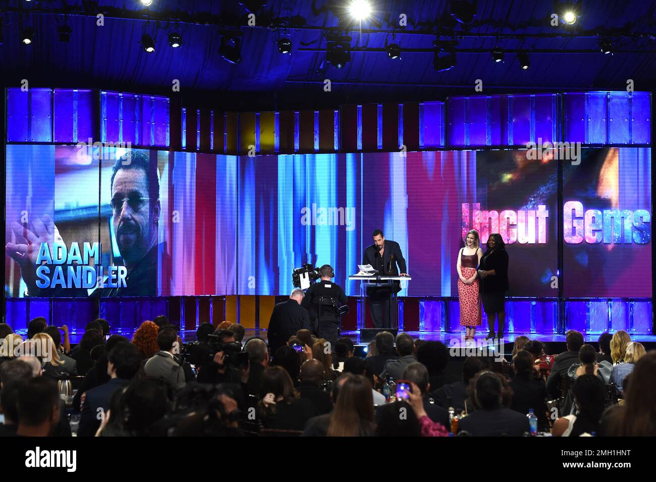 Adam Sandler accepts the award for best male lead for "Uncut Gems" at ...