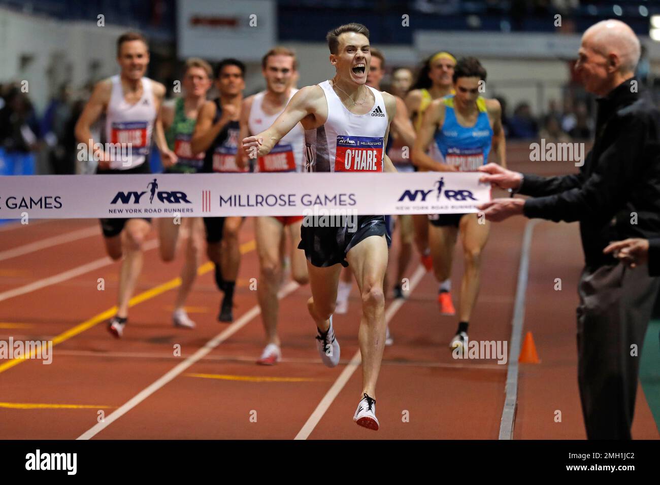 Chris O'Hare, of Britain, reacts as crosses the finish line first in ...