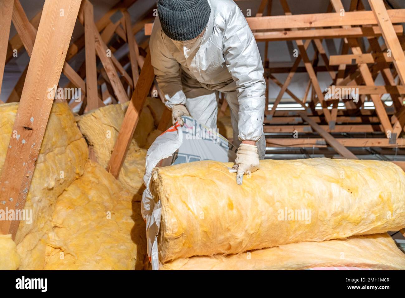 insulation of the house under the roof with the help of glass wool ...