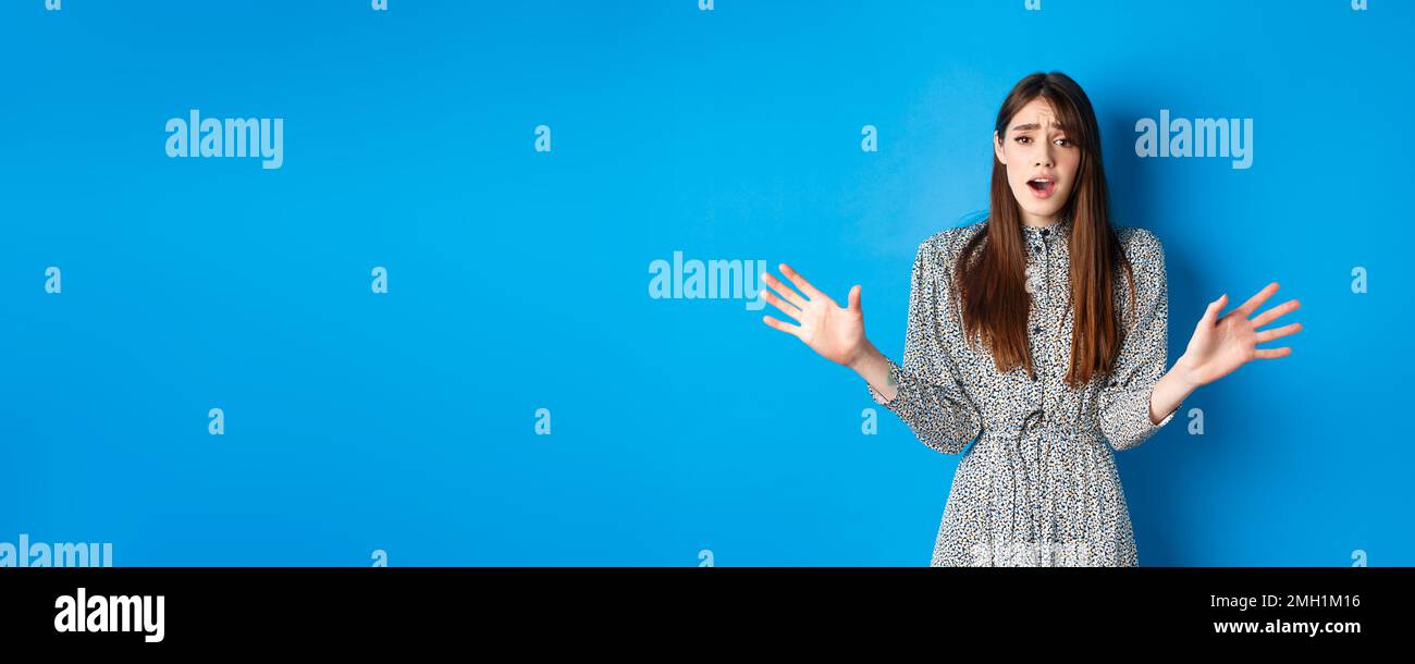 Sad and gloomy woman in dress facing failure, looking distressed and ...