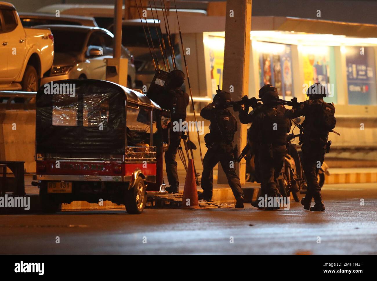 A group of armed commando soldiers are seen outside Terminal 21 Korat ...