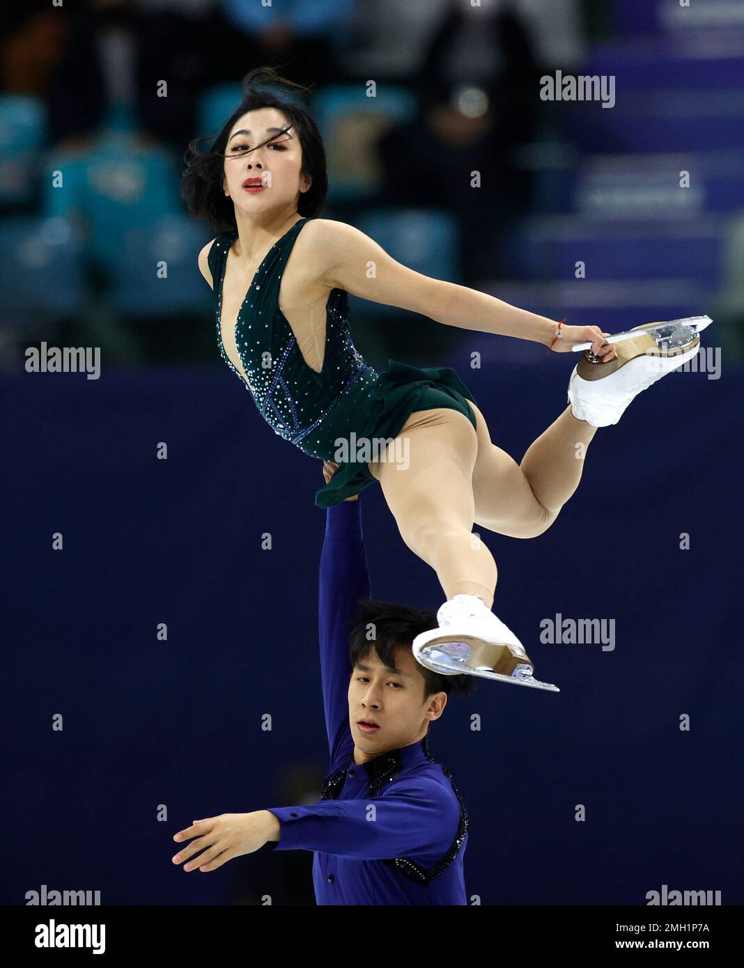 China's Sui Wenjing and Han Cong perform during the pairs free skating ...