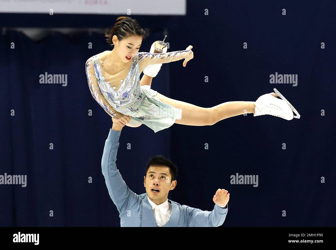 China's Peng Cheng and Jin Yang perform during the pairs free skating ...