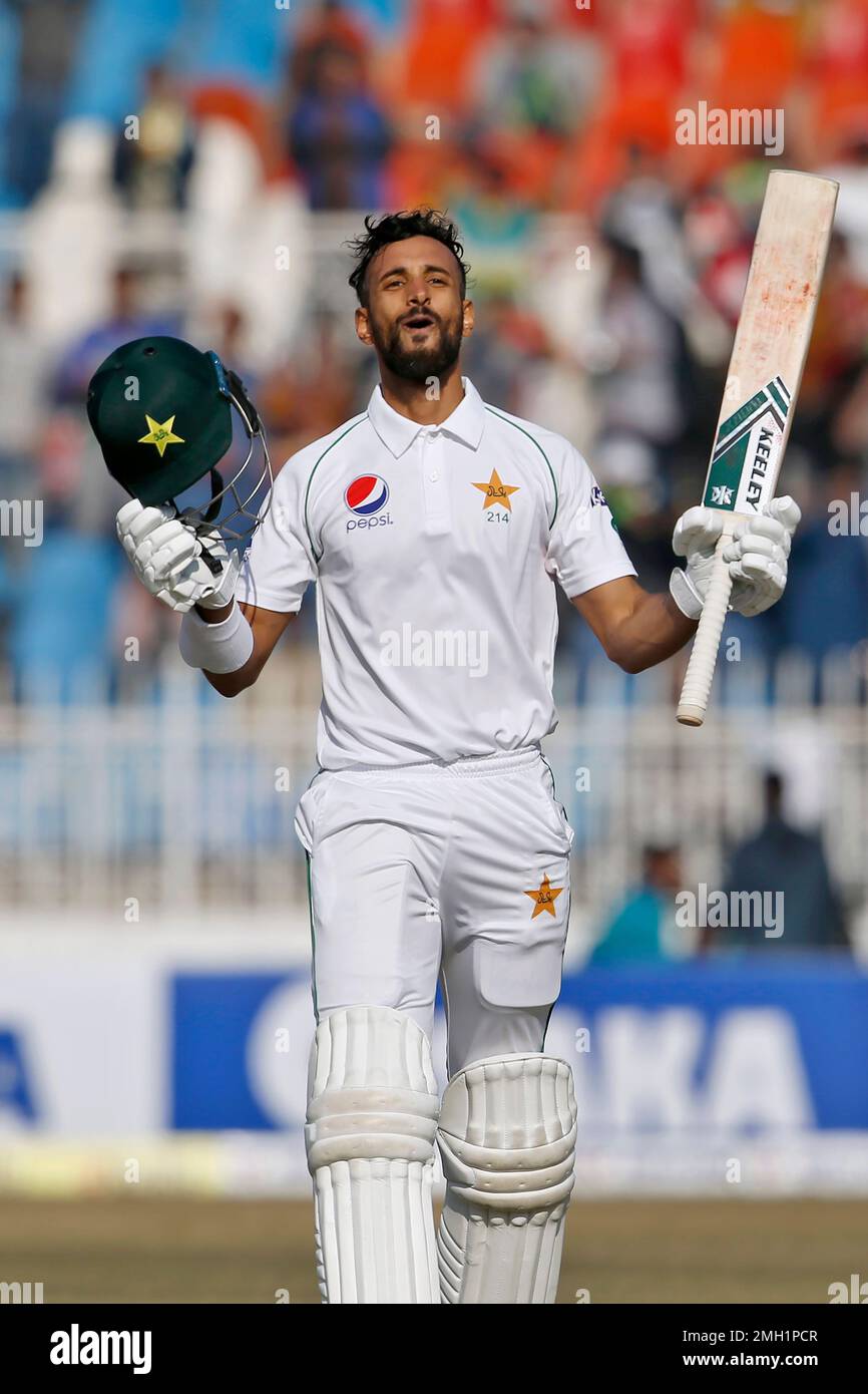 Pakistani batsman Shan Masood celebrates after completing his century ...