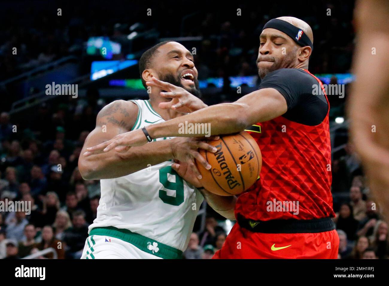 Atlanta Hawks' Vince Carter fouls Boston Celtics guard Brad Wanamaker ...