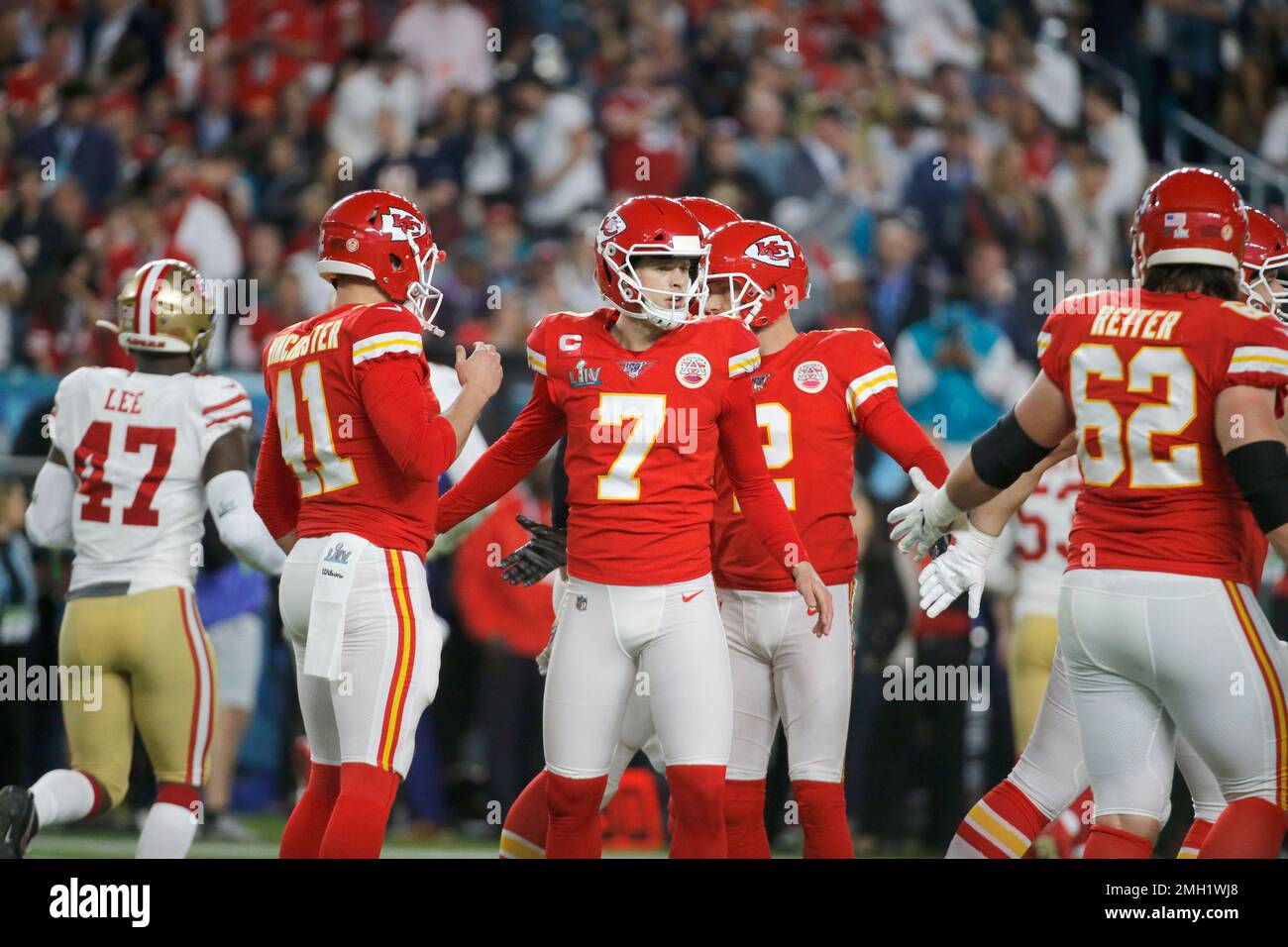Kansas City Chiefs kicker Harrison Butker (7) is congratulated after a ...