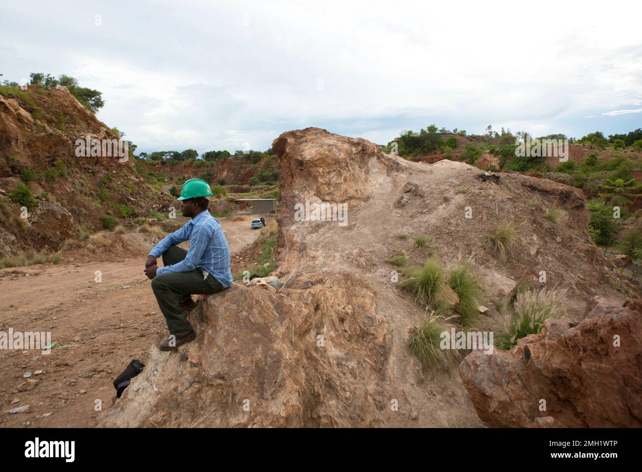 An artisinal miner is seen near the site where some miners were trapped ...