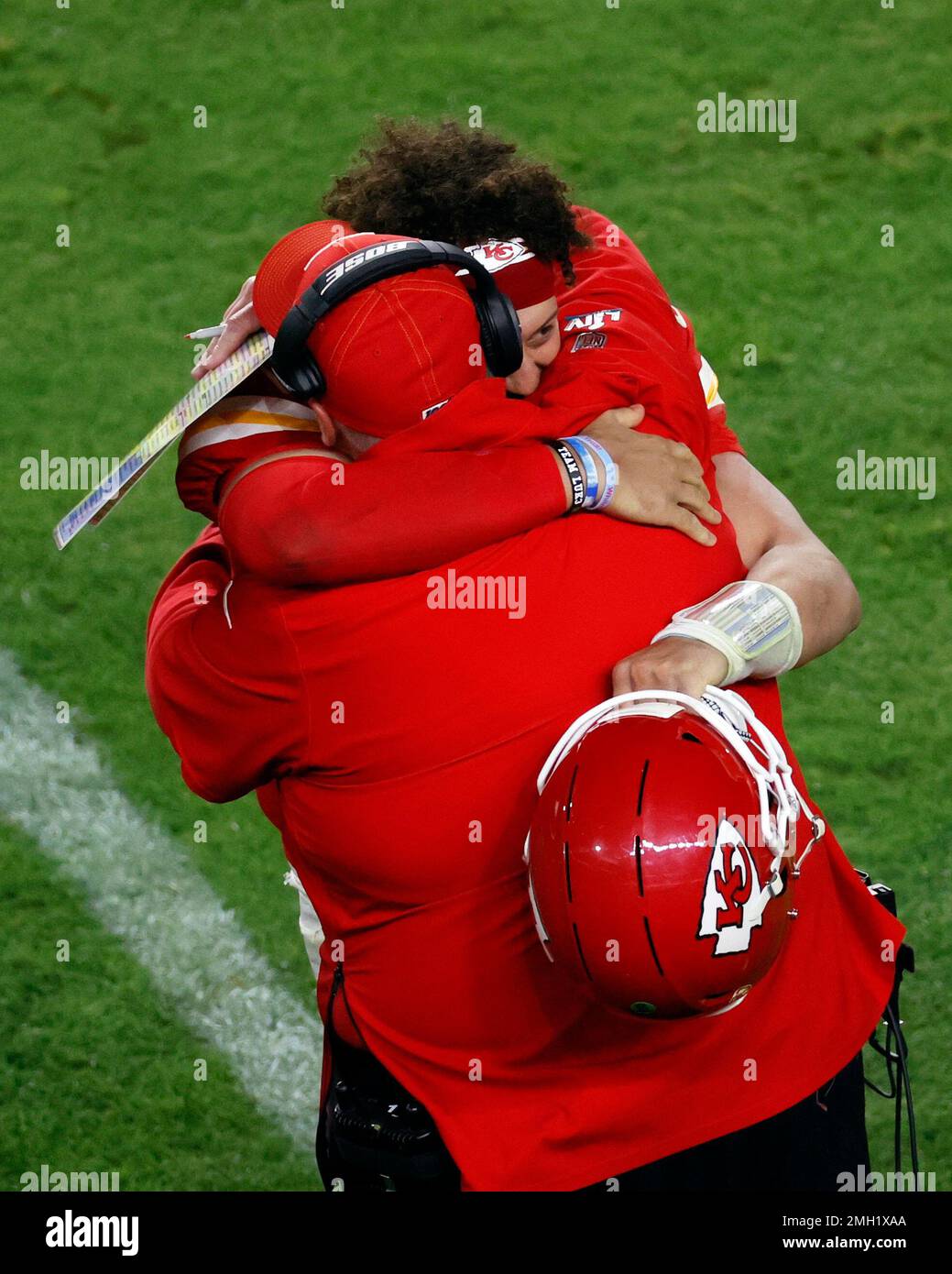 Kansas City Chiefs quarterback Patrick Mahomes (15) hugs head coach ...