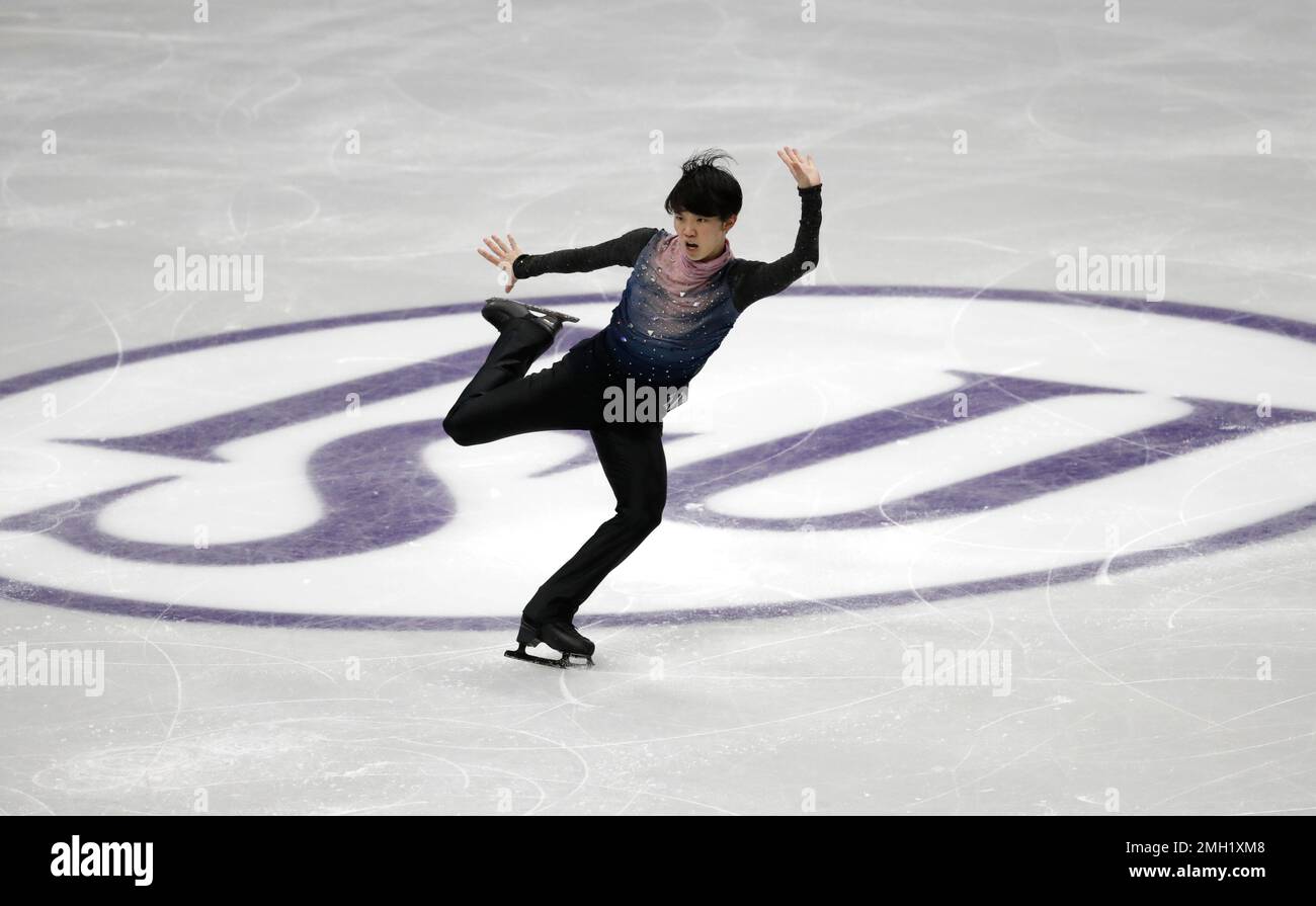 Japan's Kazuki Tomono performs during the men's single short program ...