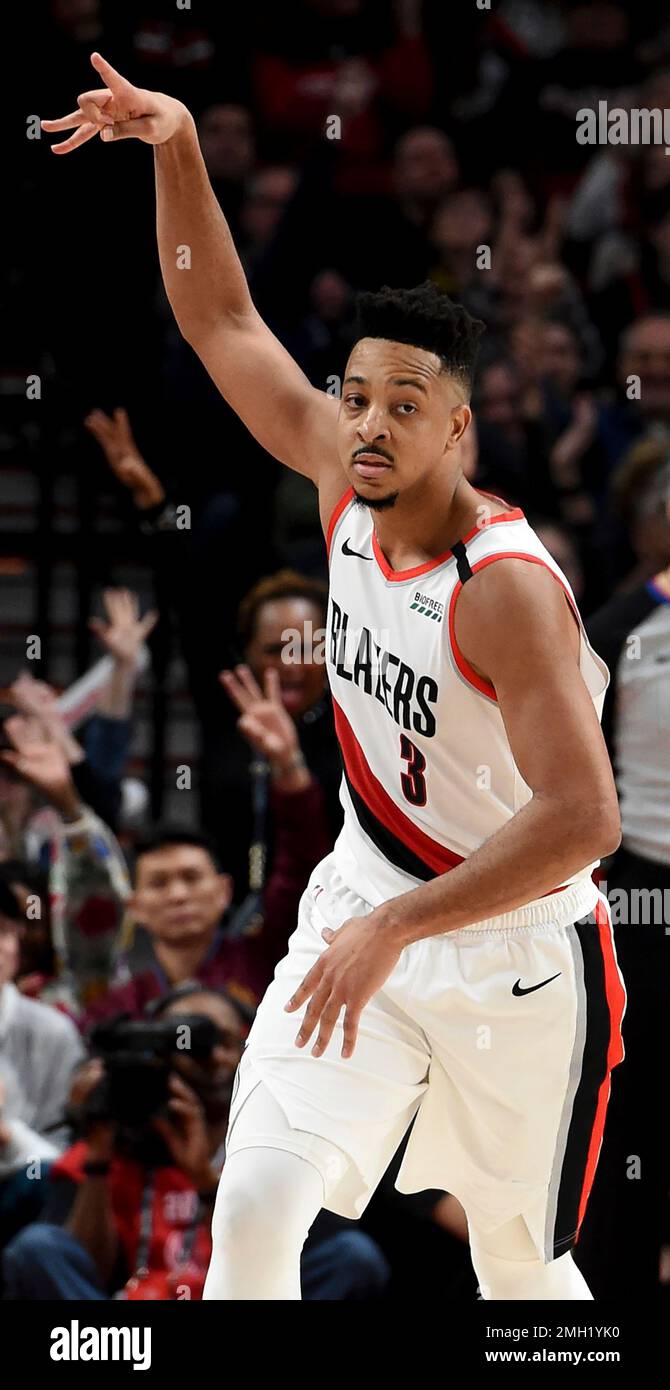 Portland Trail Blazers guard CJ McCollum reacts after hitting a shot ...