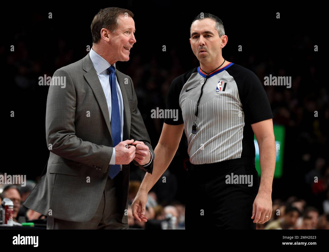 Portland Trail Blazers head coach Terry Stotts, left, speaks with ...