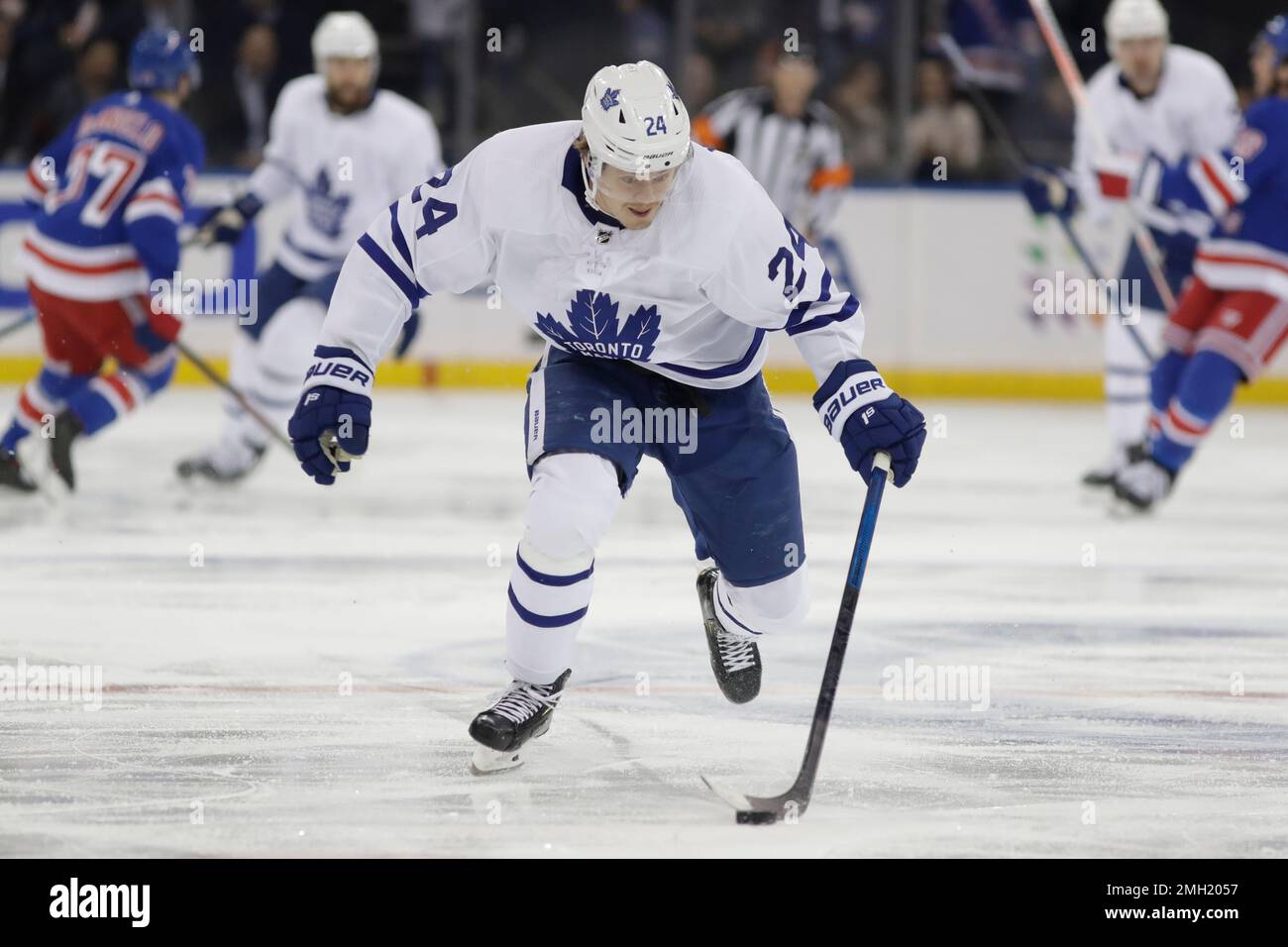 Toronto Maple Leafs' Kasperi Kapanen (24) chases down the puck during ...