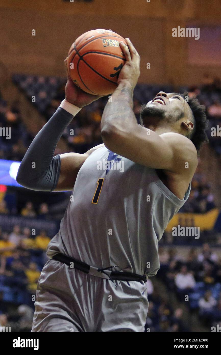 West Virginia forward Derek Culver (1) goes to make a shot against Iowa ...