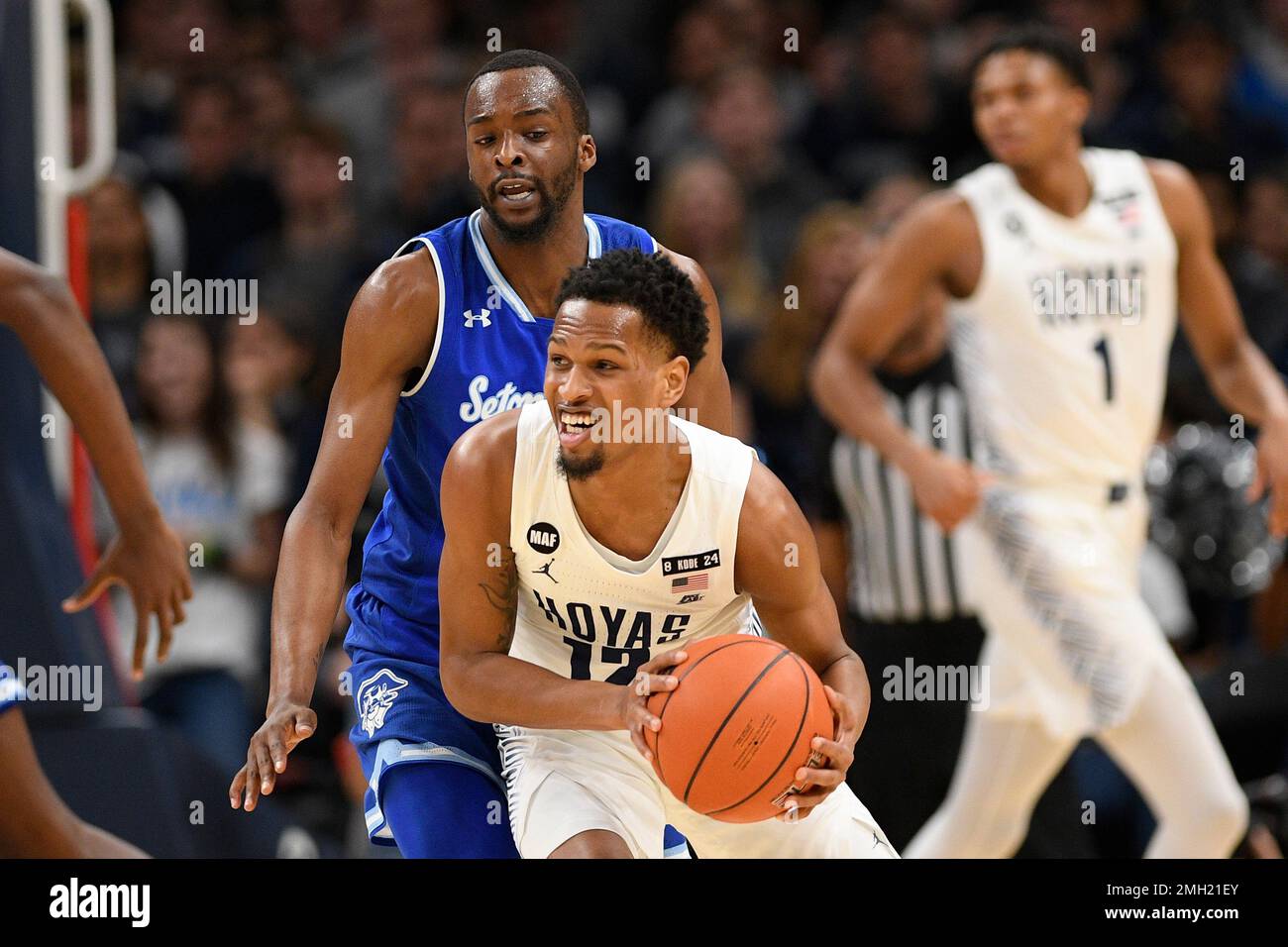 Georgetown guard Terrell Allen (12) handles the ball n front of Seton ...