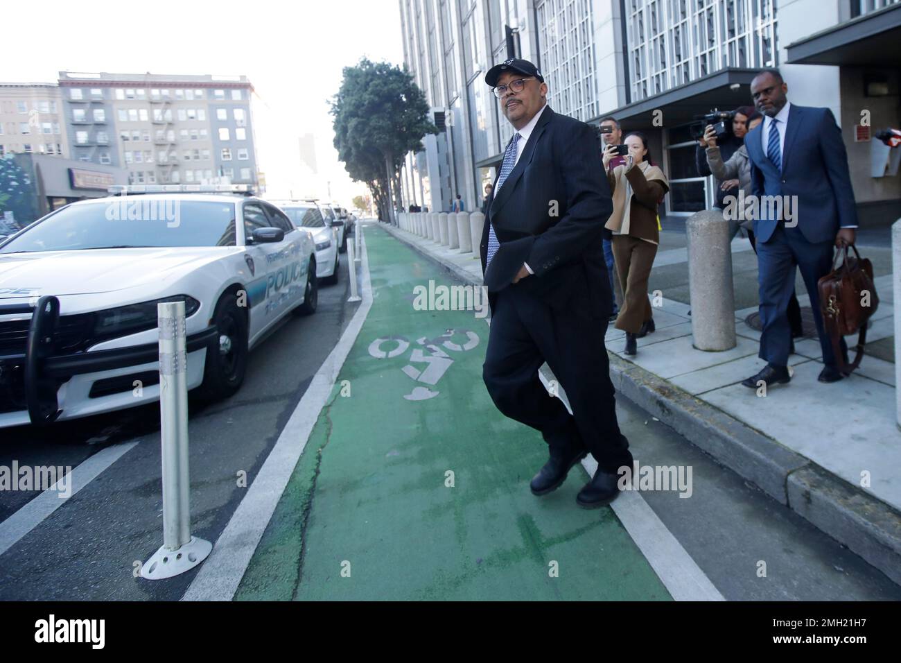 Mohammed Nuru, director of San Francisco Public Works, center, walks in ...