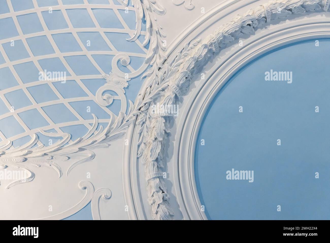 White gypsum bas-relief, ceilind design details in rococo style ...