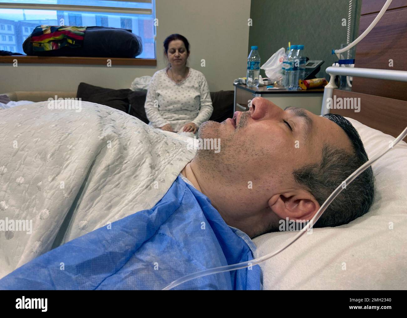 Turkish survivors Seref Demirtas and his wife Rumeysa Demirtas are seen ...